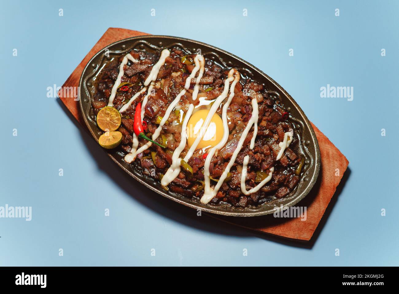 A top view of a delicious plate of special Lomi with egg and meat ...