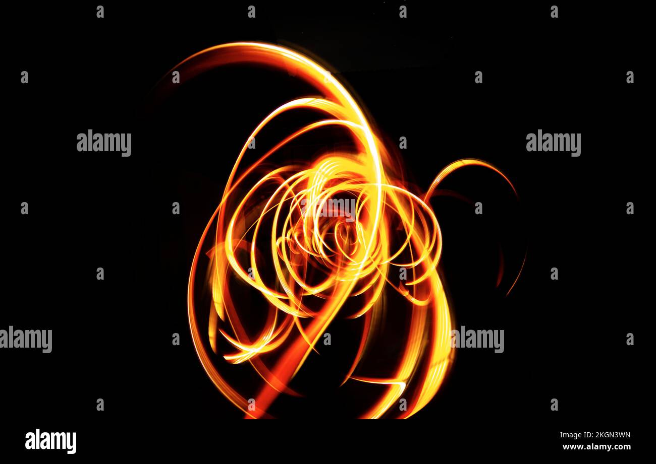 Fiery stains on a dark background Stock Photo - Alamy