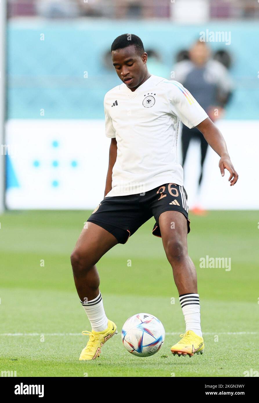 Doha, Qatar. 23rd Nov, 2022. Youssoufa Moukoko of Germany warms up ...