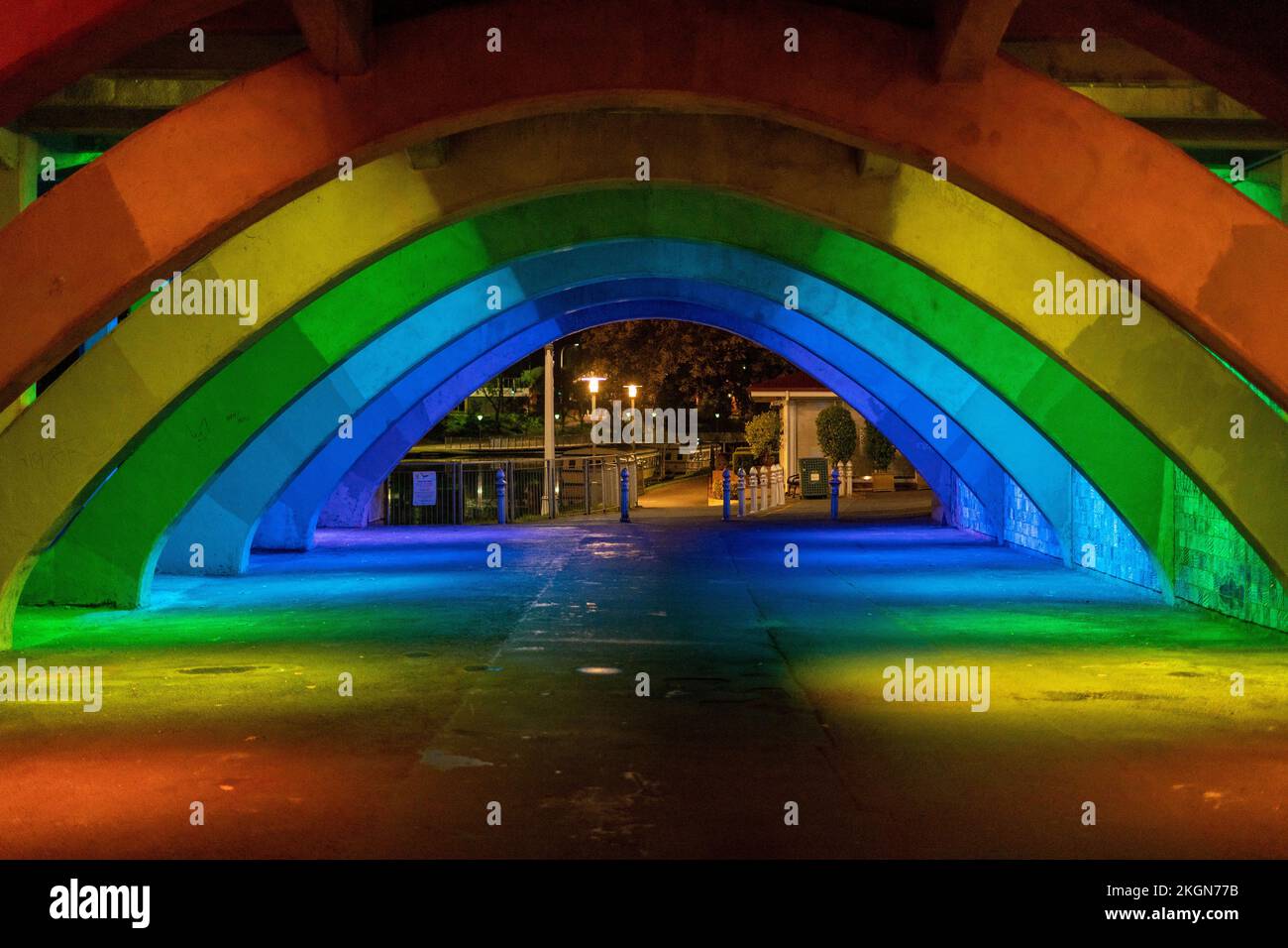 The rainbow lights under a bridge tunnel at night in Adelaide, South ...