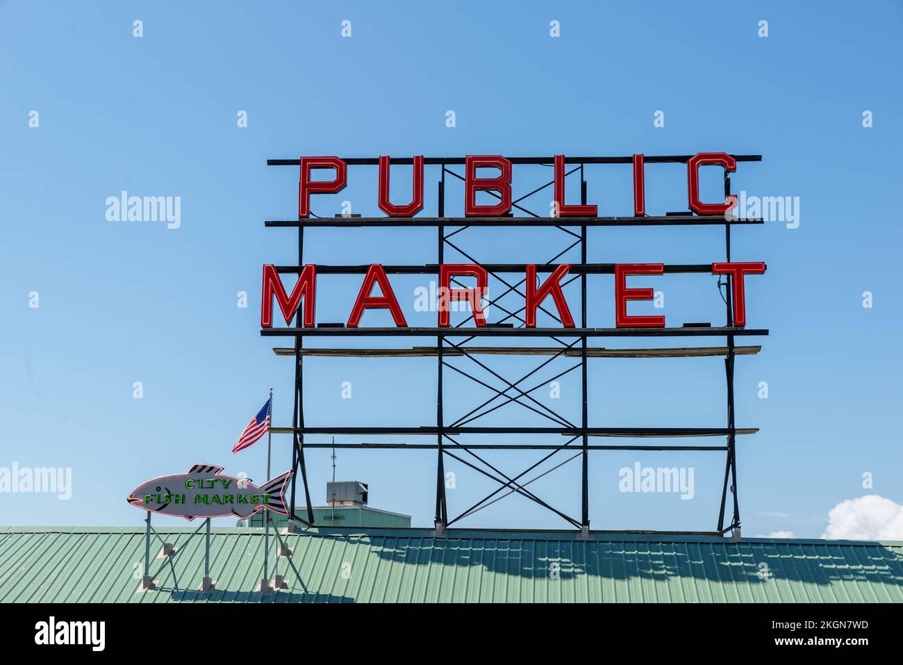 The red Public market sign with the American flag before the blue ...