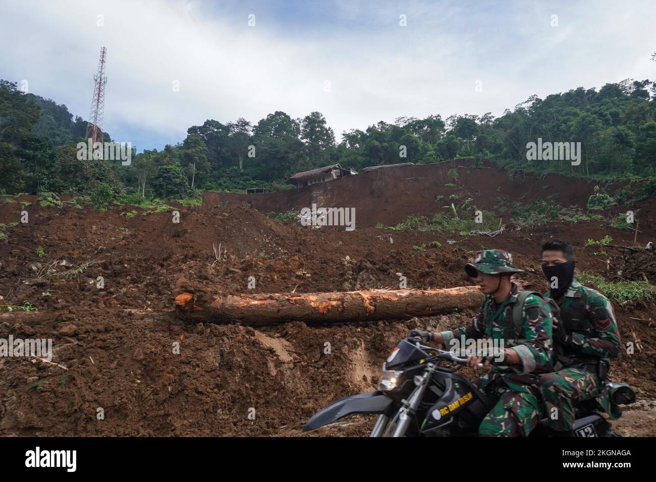 Cianjur, West Java, Indonesia. 22nd Nov, 2022. Military members pass ...