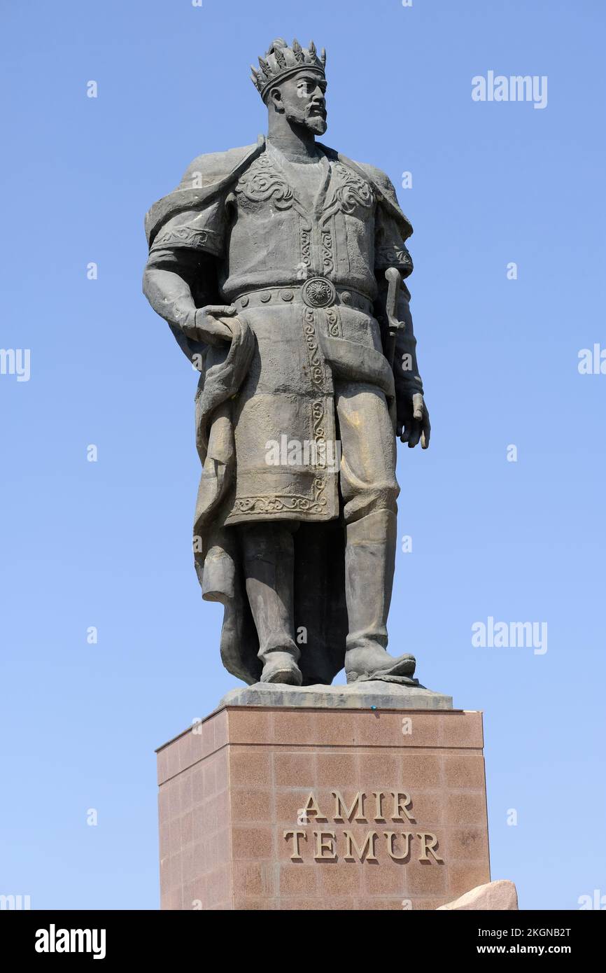 Shakhrisabz Uzbekistan - statue of Amir Temur in ront of the ruins of ...