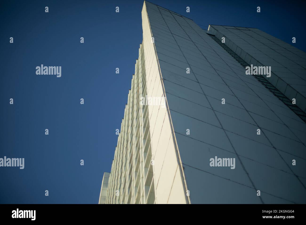 Tall building. Lots of floors. Art Nouveau architecture. Small windows ...