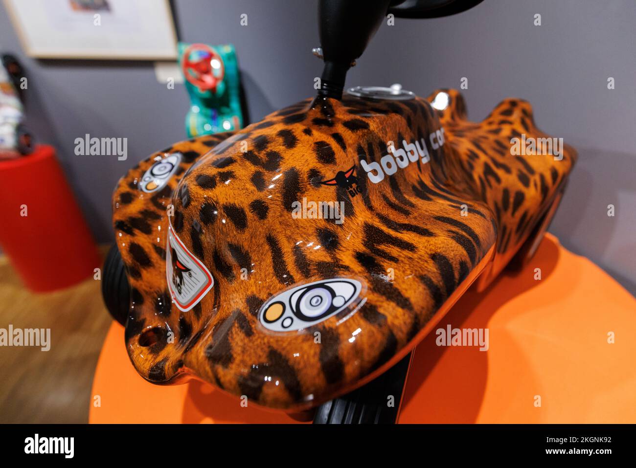23 November 2022, Bavaria, Fürth: A Bobby-Car in leopard look is on ...