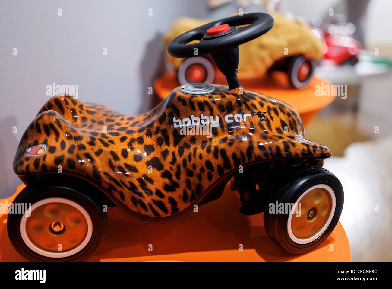 23 November 2022, Bavaria, Fürth: A Bobby-Car in leopard look is on ...