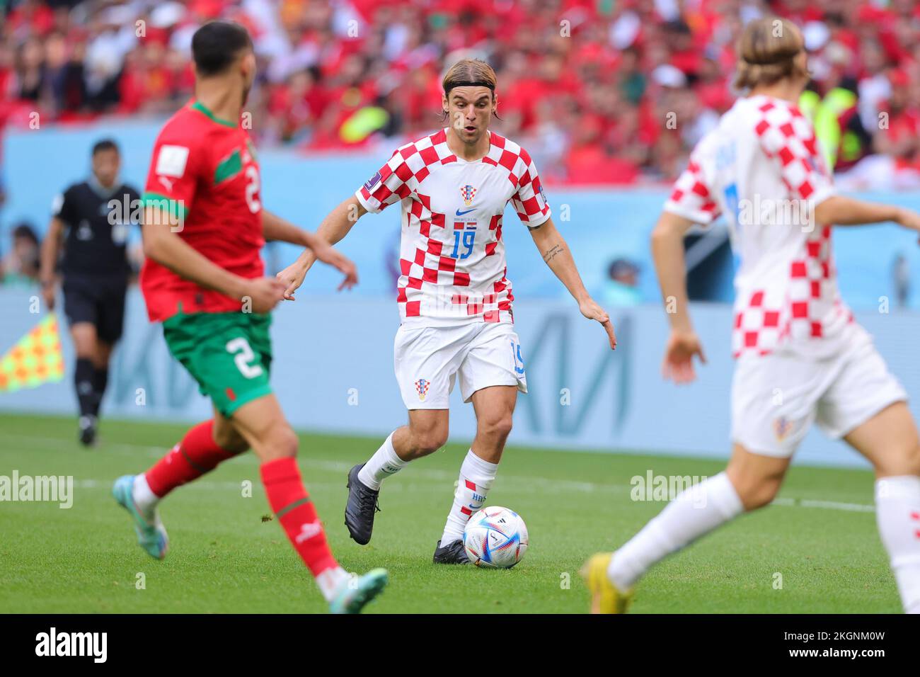 Al Khor, Qatar. 23rd Nov, 2022. Borna Sosa of Croatia dribbles the ball during the FIFA World ...