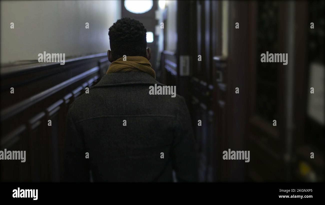 Man walking through room hi-res stock photography and images - Alamy