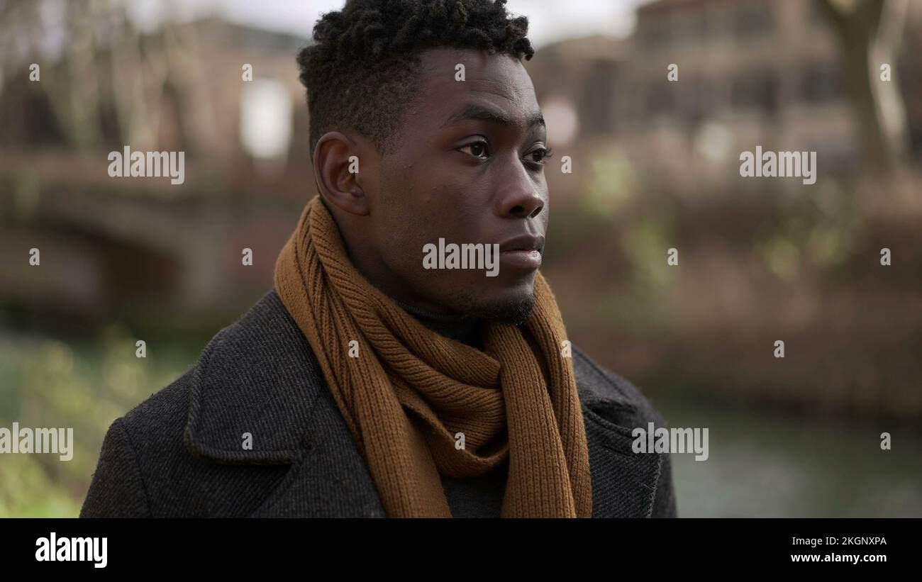 Young black man walking outside in nature during winter season2 Stock ...