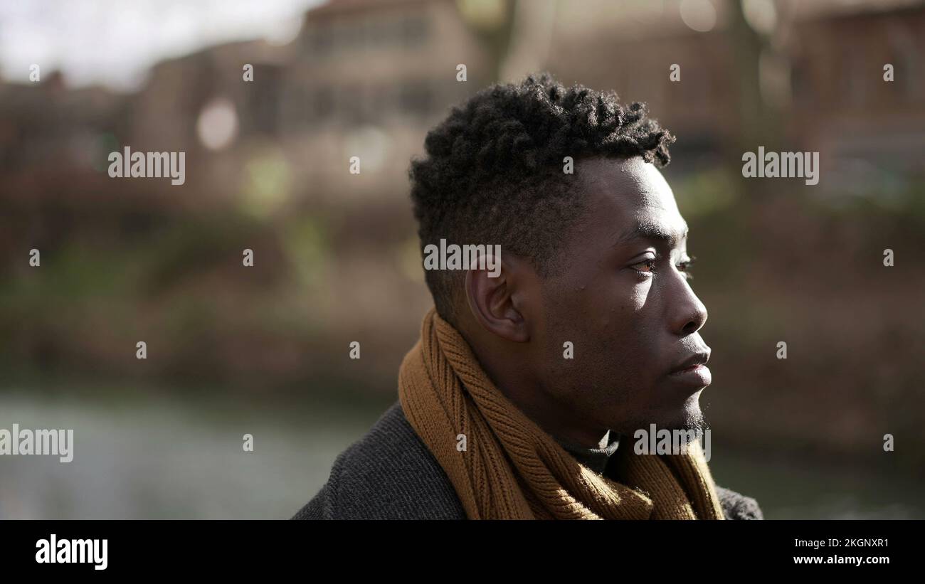 Young black man walking outside in nature during winter season2 Stock ...