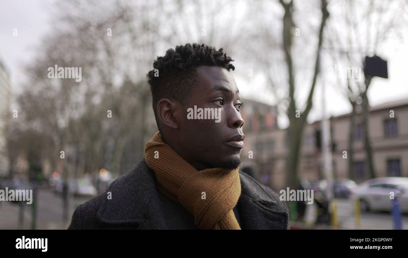 Young elegant black African man walking outside in city sidewalk3 Stock ...