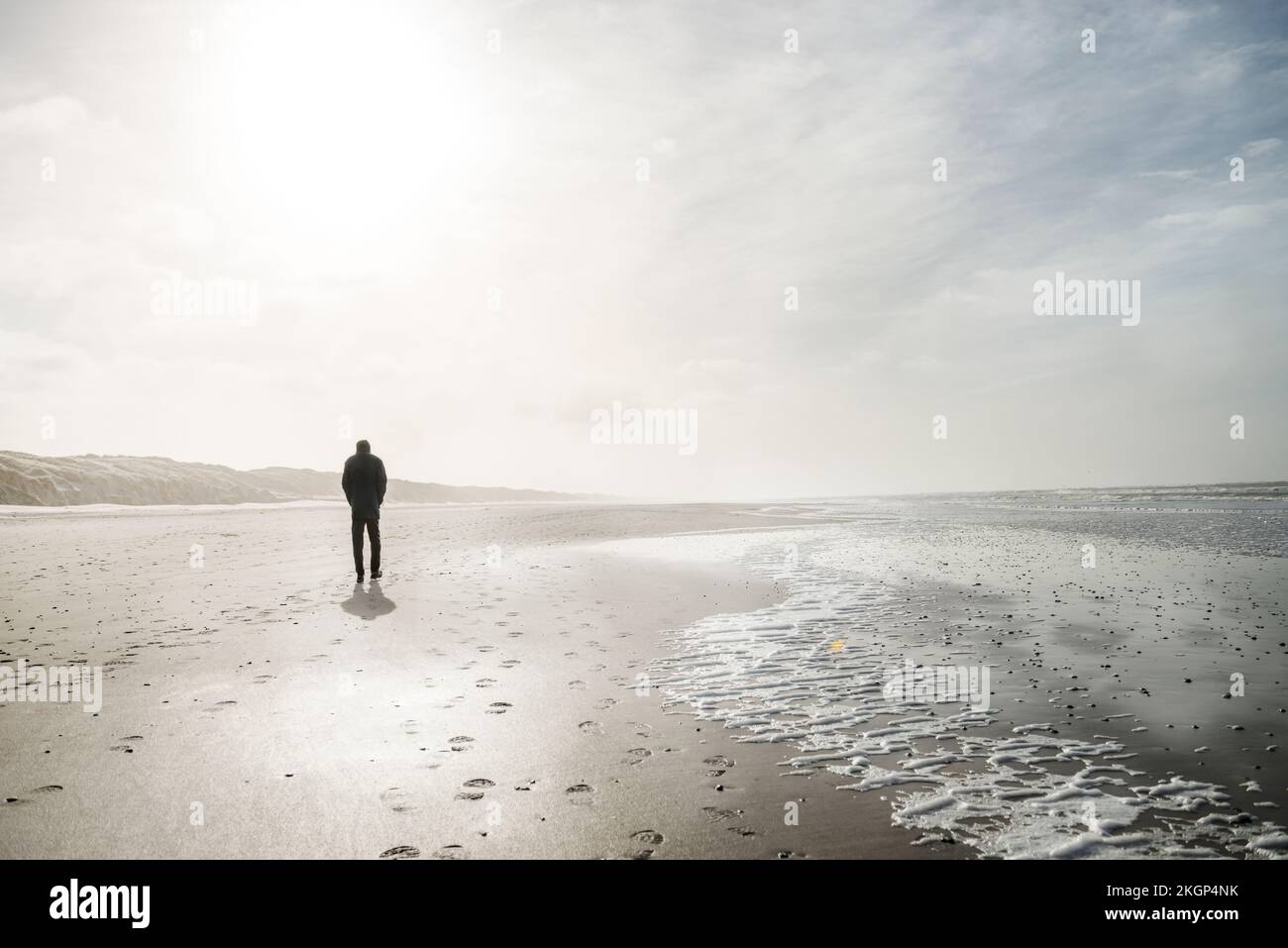 Denmark, Henne Strand, Person walking alone on the beach Stock Photo - Alamy