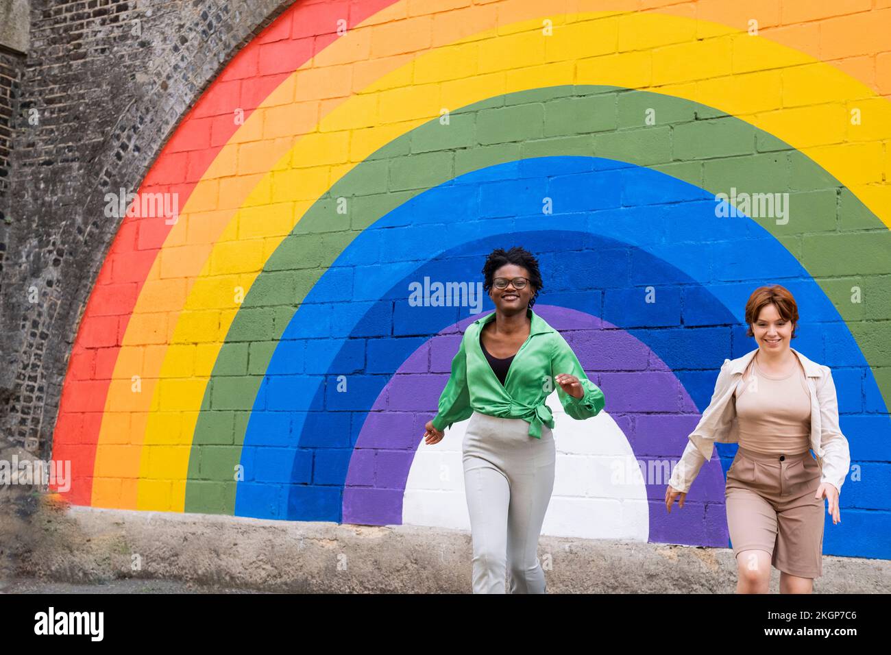 Running with friend woman hi-res stock photography and images - Alamy