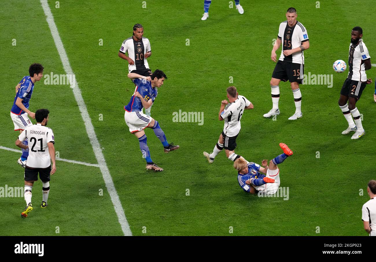 Japan’s Daichi Kamada shoots during the FIFA World Cup Group E match at ...