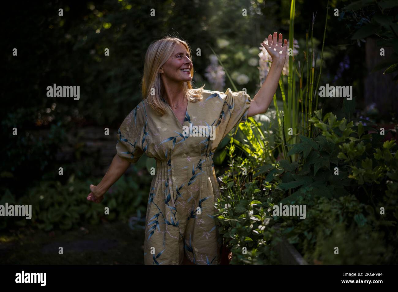 Mature woman enjoying beauty nature hi-res stock photography and images ...