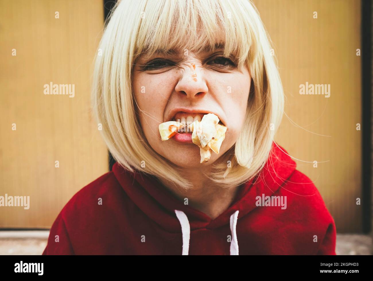 Blond woman facial expression hi-res stock photography and images - Alamy