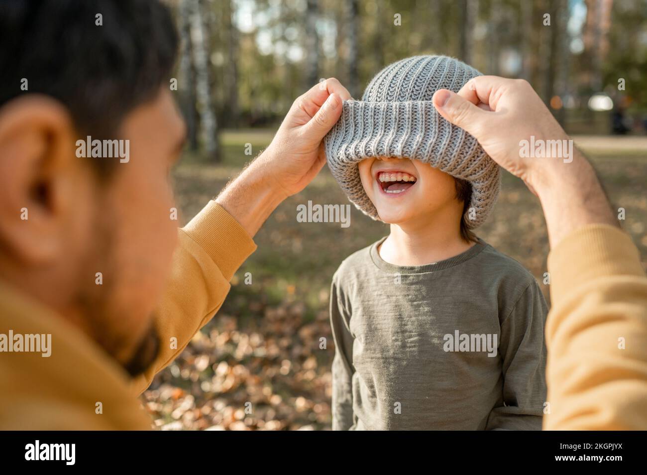 Boy adjusting his cap hi-res stock photography and images - Alamy