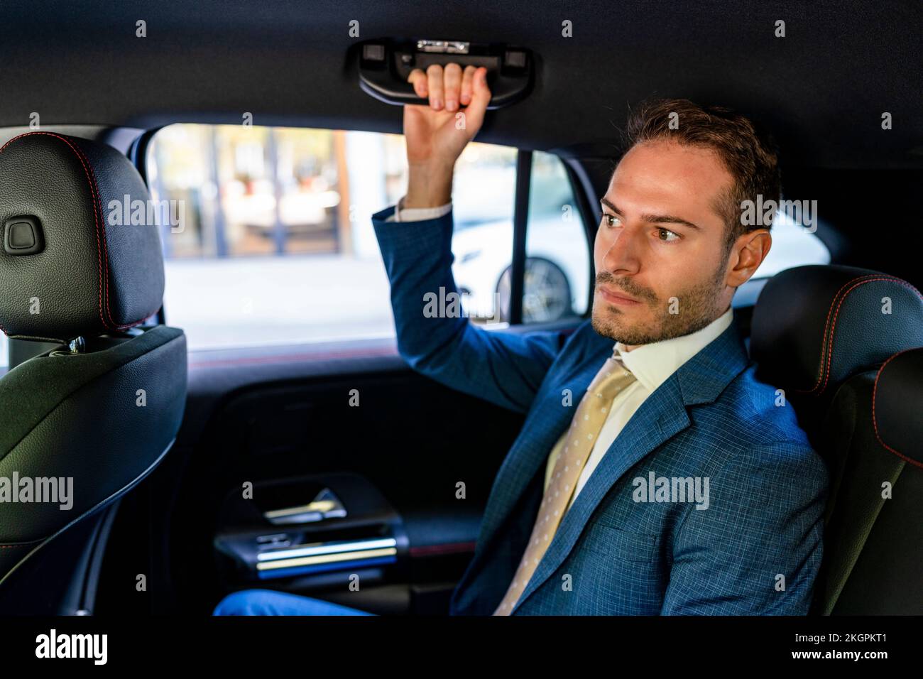 Sitting in blue seat business hi-res stock photography and images - Alamy