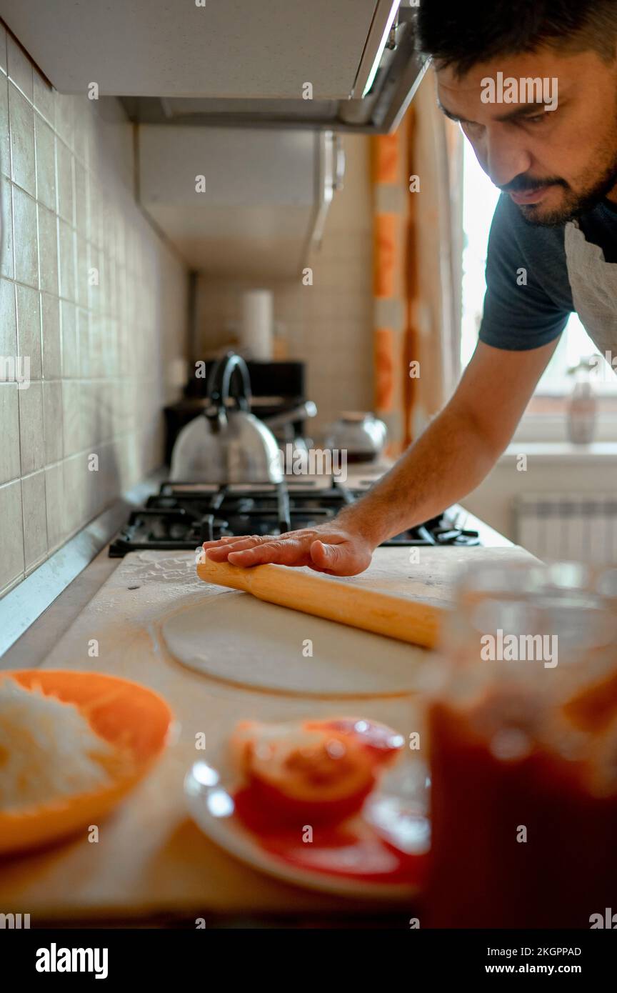 Rolling pizza hi-res stock photography and images - Alamy