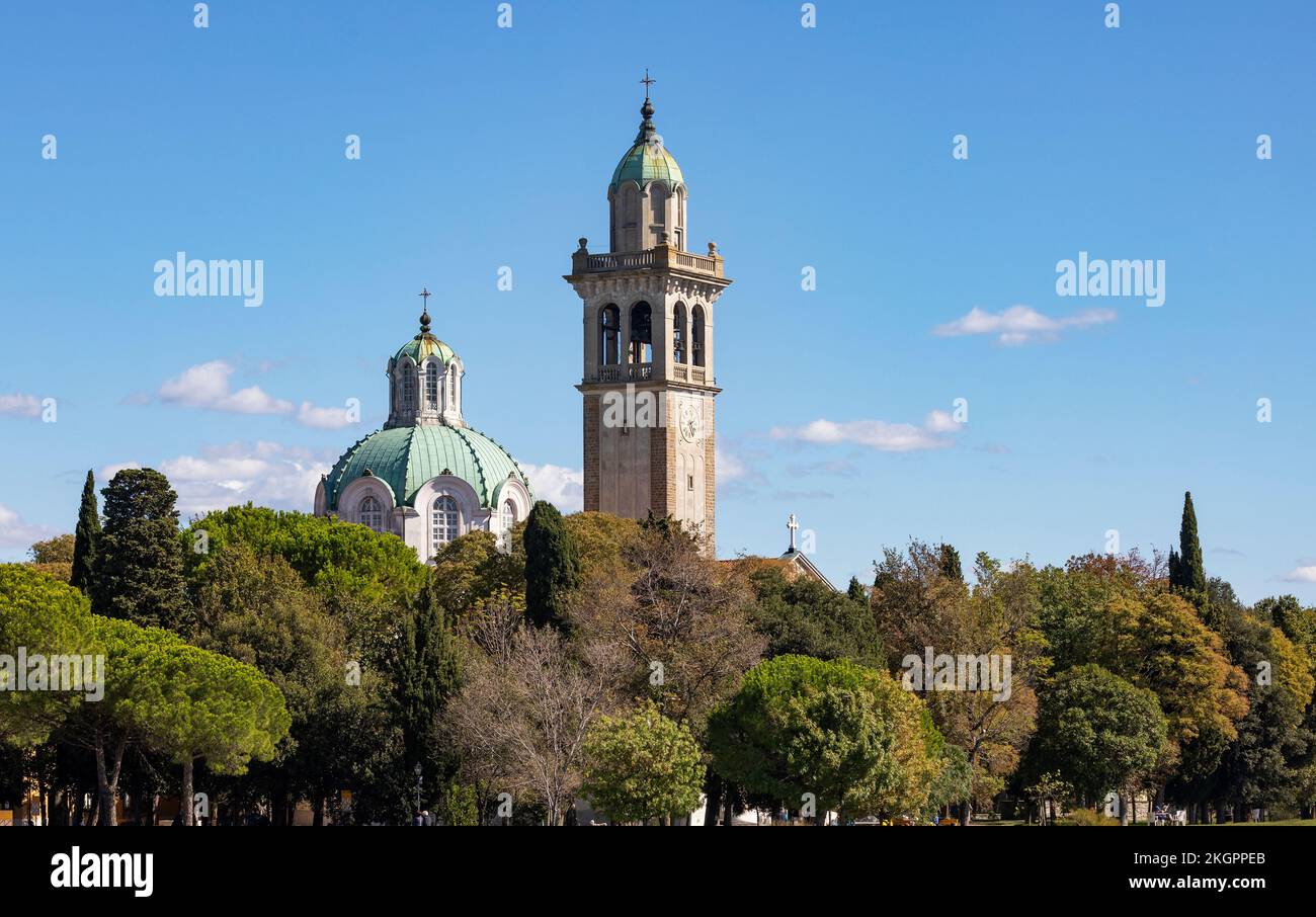 Italy, Friuli Venezia Giulia, Grado, Trees in front of Santuario di ...