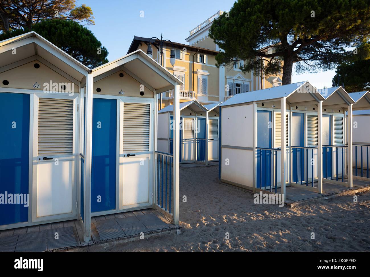 Italy, Friuli Venezia Giulia, Grado, Rows of beach huts on beach Stock ...