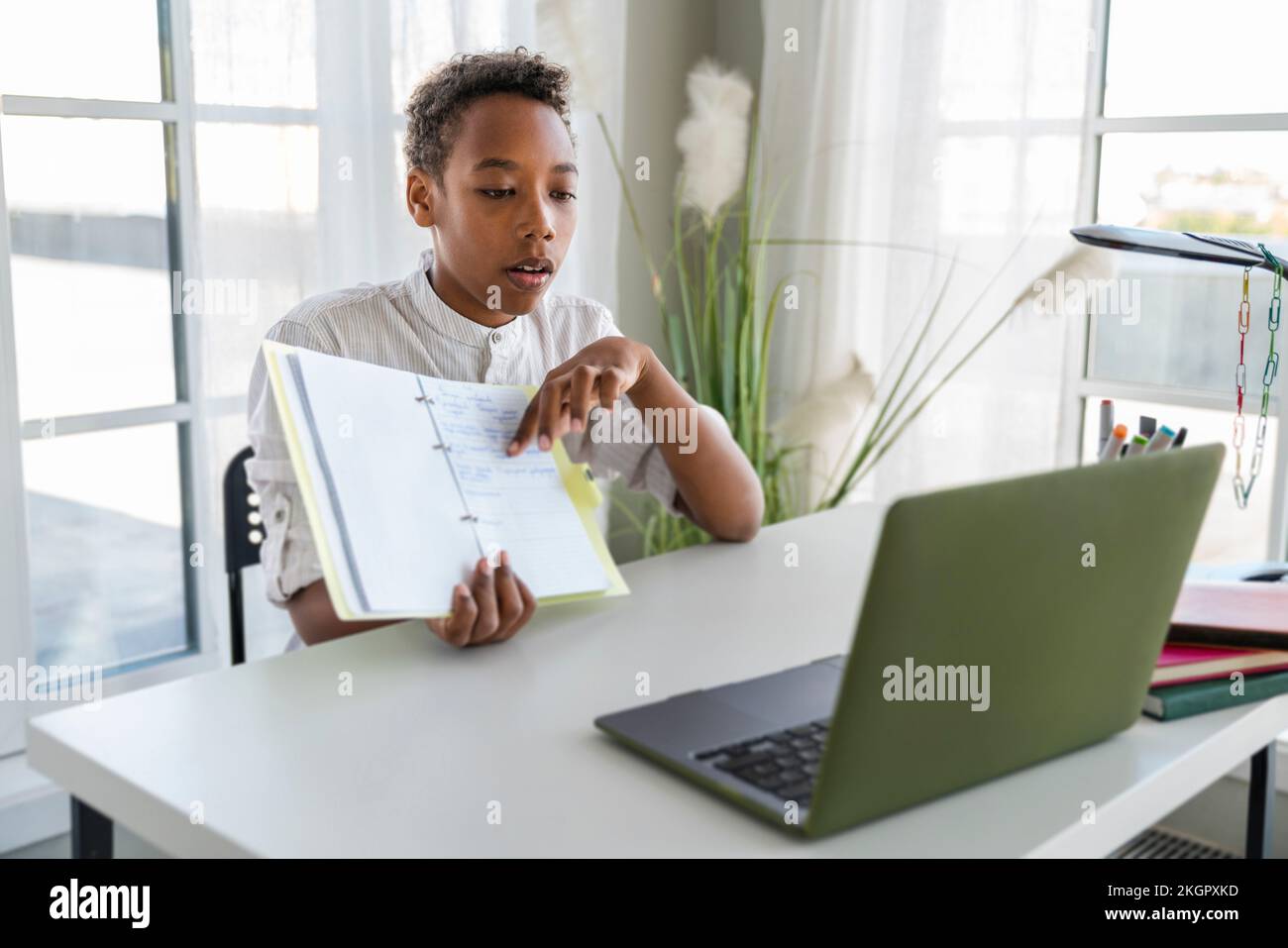 Laptop school notes hi-res stock photography and images - Alamy