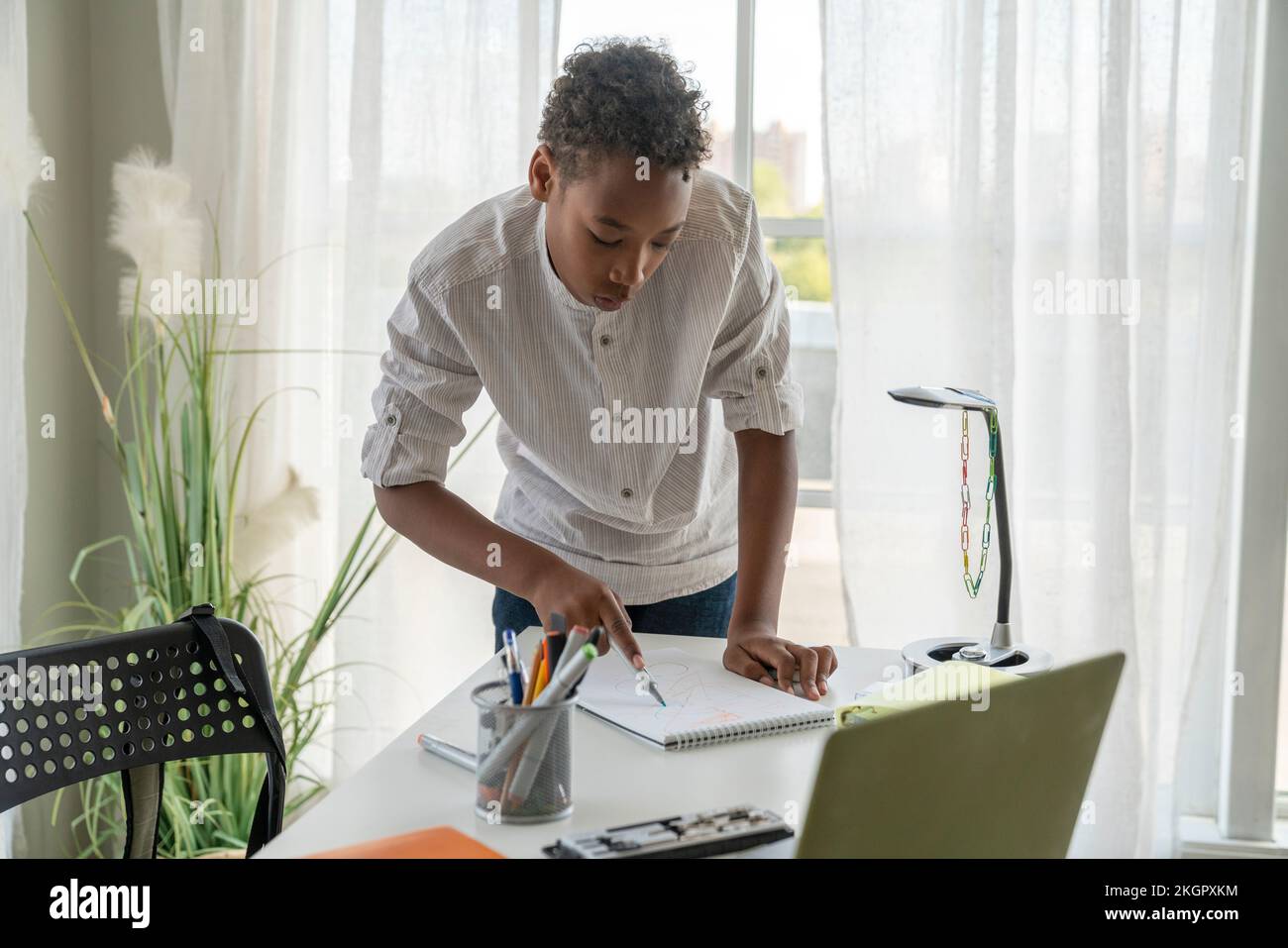 Homework table hi-res stock photography and images - Alamy
