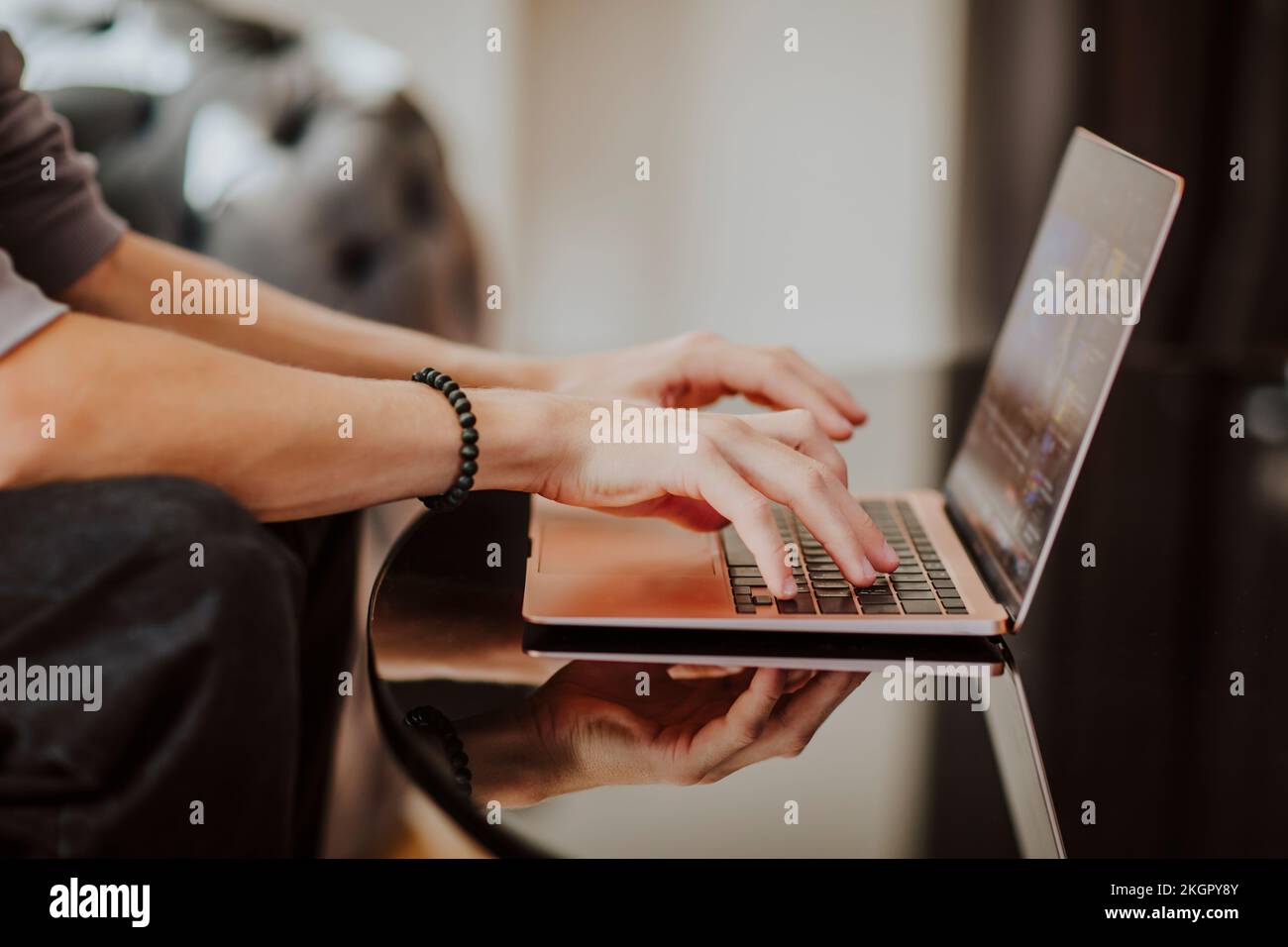 Teenage student typing on laptop and e-learning at home Stock Photo - Alamy