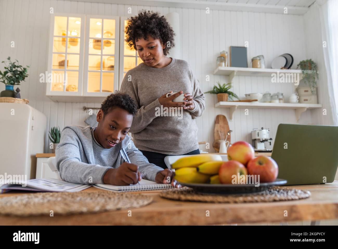 Boy writing notes hi-res stock photography and images - Alamy