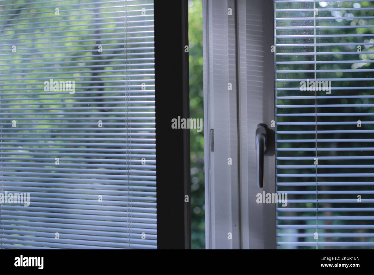 Blinds half open hi-res stock photography and images - Alamy