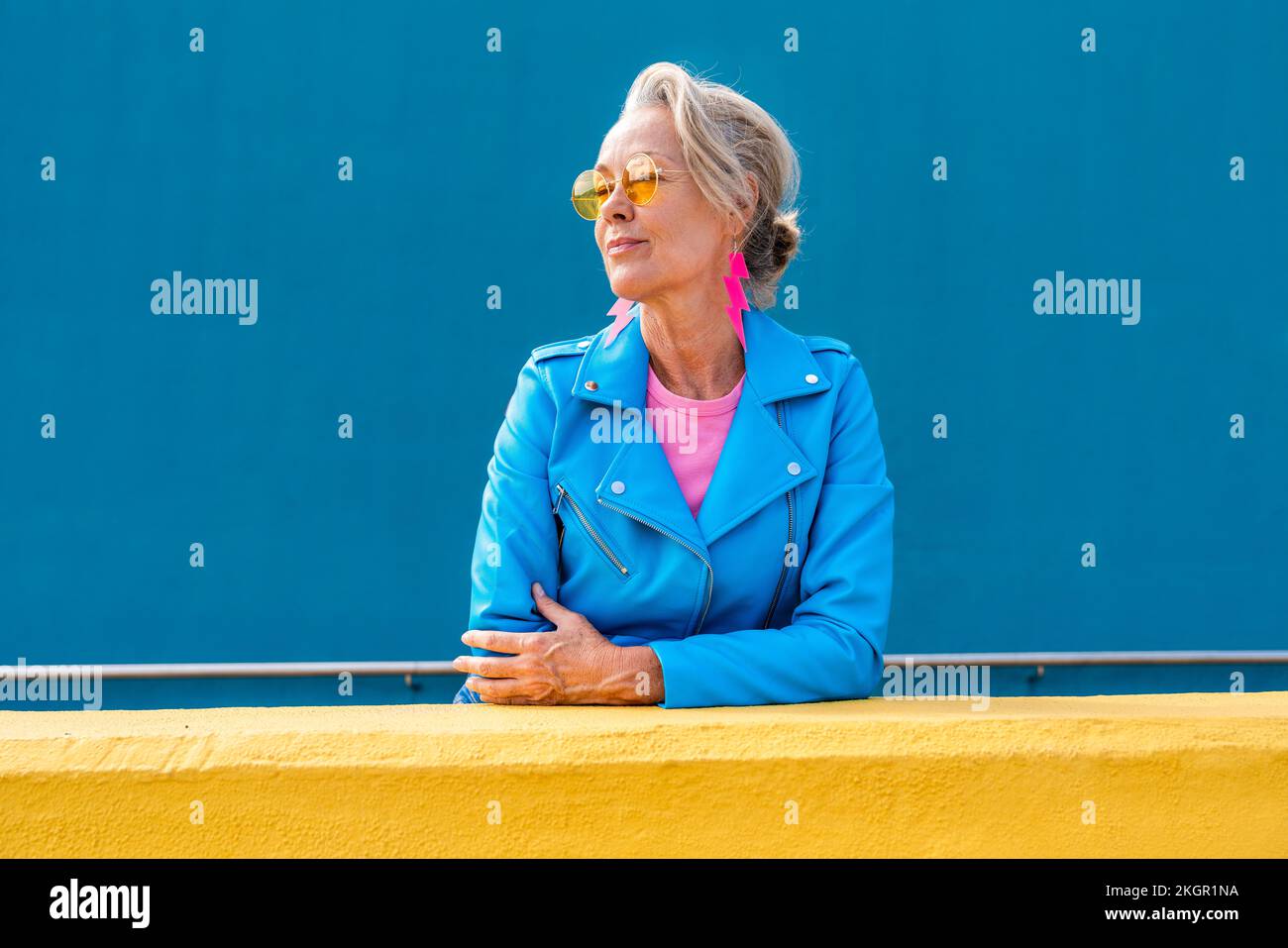 Woman grey hair in blue hi-res stock photography and images - Alamy