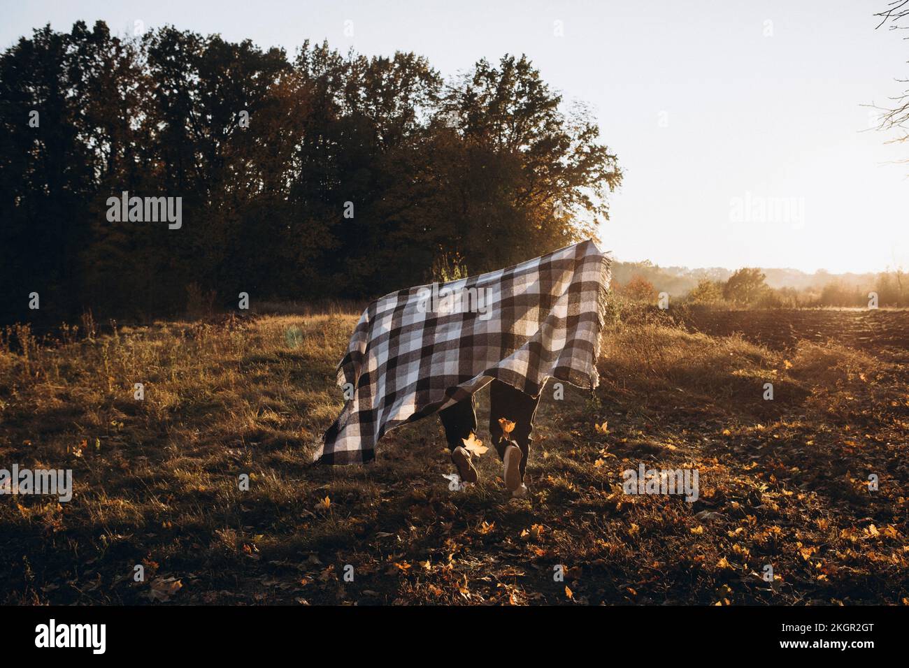 Running with blanket hi-res stock photography and images - Alamy