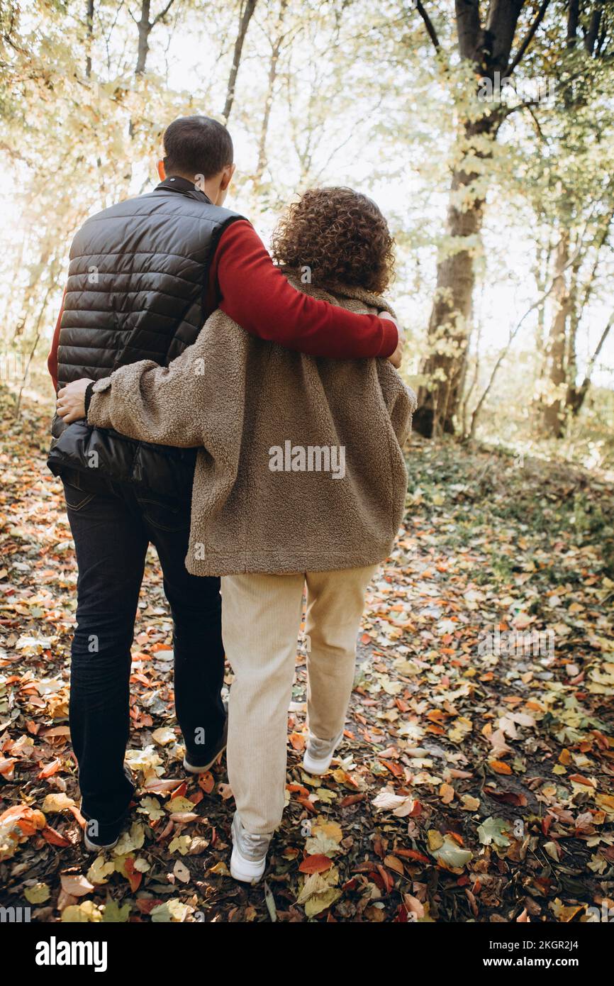 Two arms around tree hi-res stock photography and images - Alamy