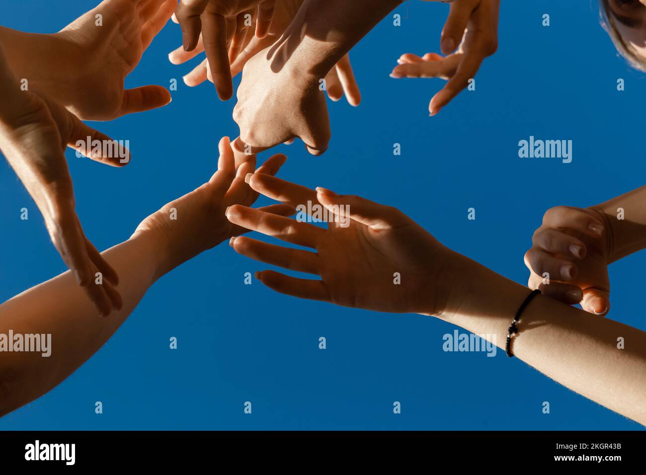 Group young people under hi-res stock photography and images - Alamy