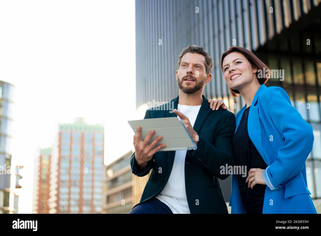 Standing communication explaining technology hi-res stock photography ...