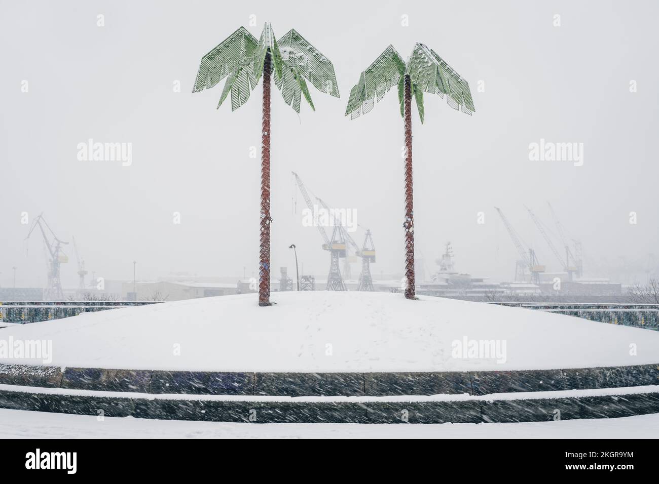 Germany, Hamburg, Artificial palm trees in Park Fiction during snowfall ...