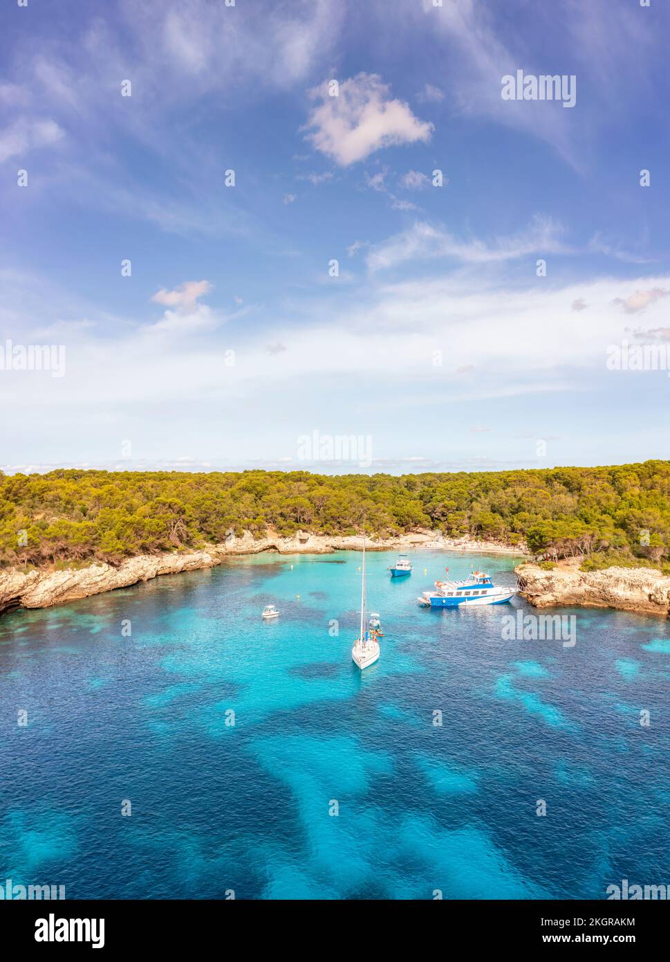 Spain, Balearic Islands, Menorca, Aerial view of boats in Cala Turqueta ...