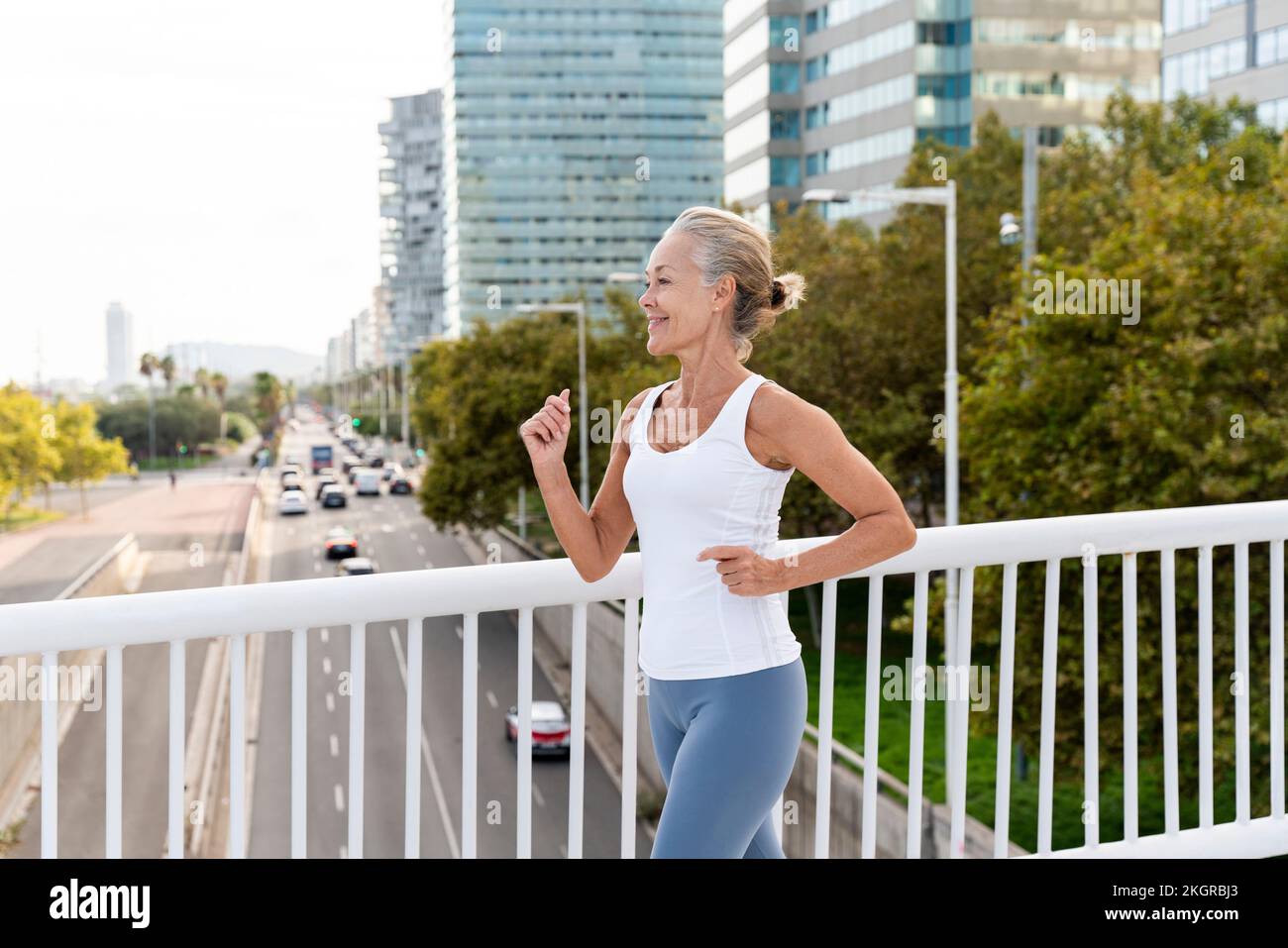 Fitness woman jogging outdoors city hi-res stock photography and images ...