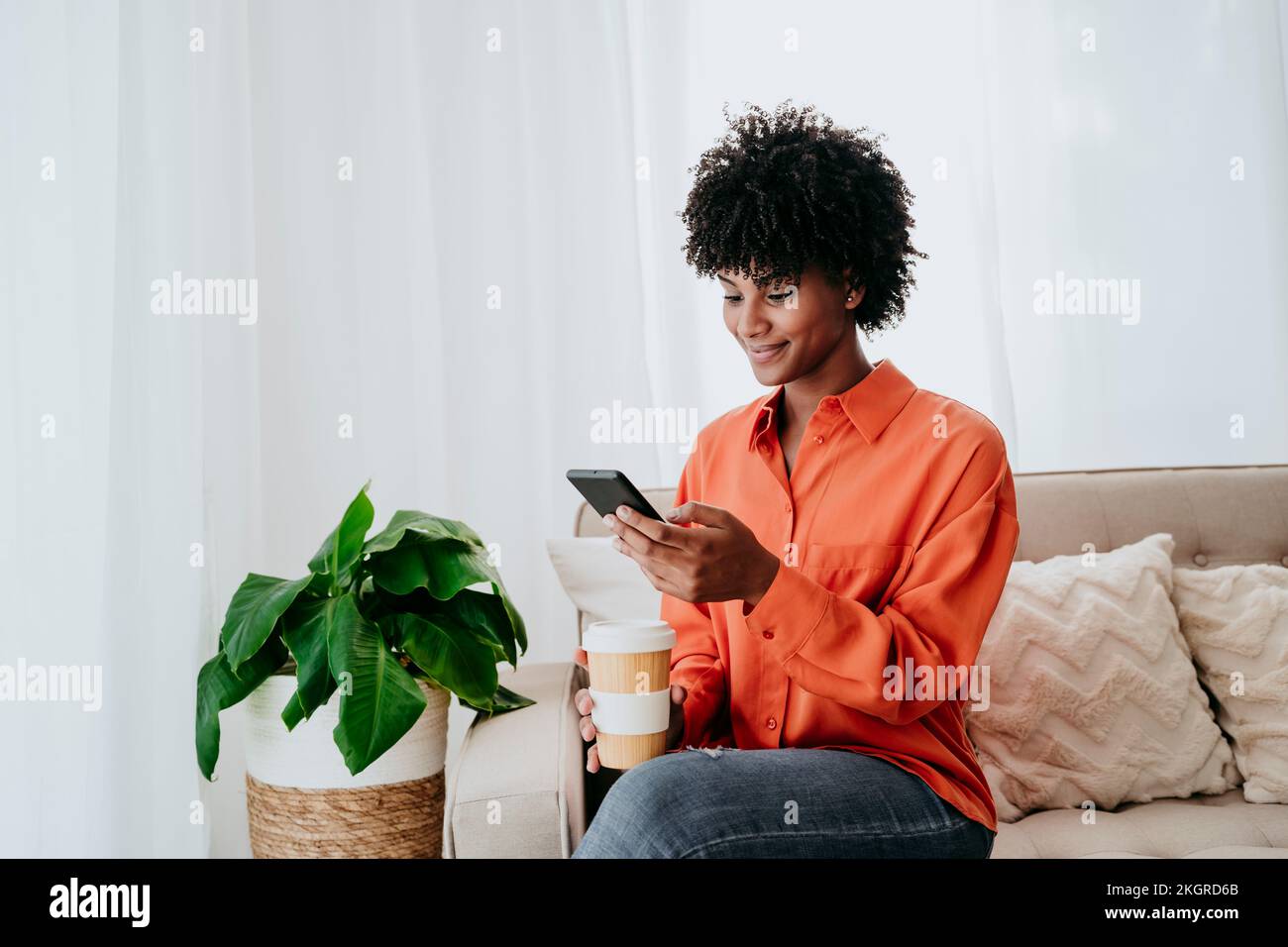 Young freelancer disposable coffee hi-res stock photography and images ...