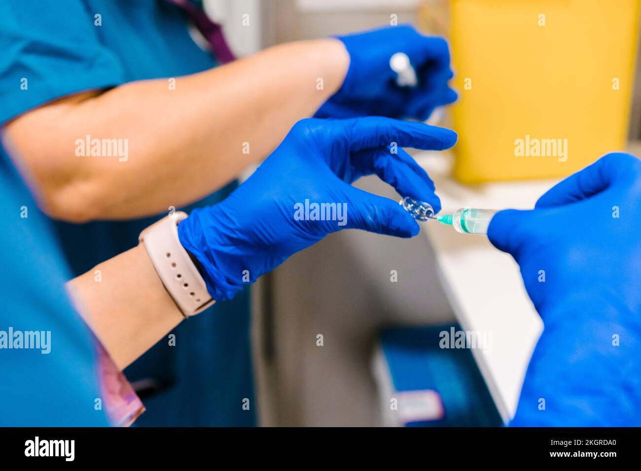 Hands of nurse preparing syringe at hospital Stock Photo - Alamy