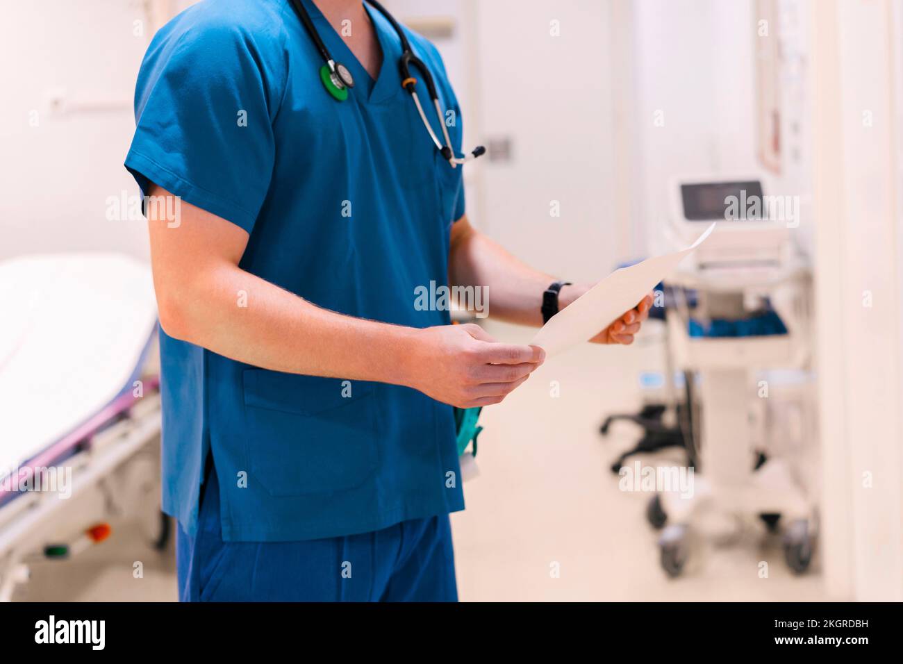 Doctor with medical test results at hospital Stock Photo - Alamy