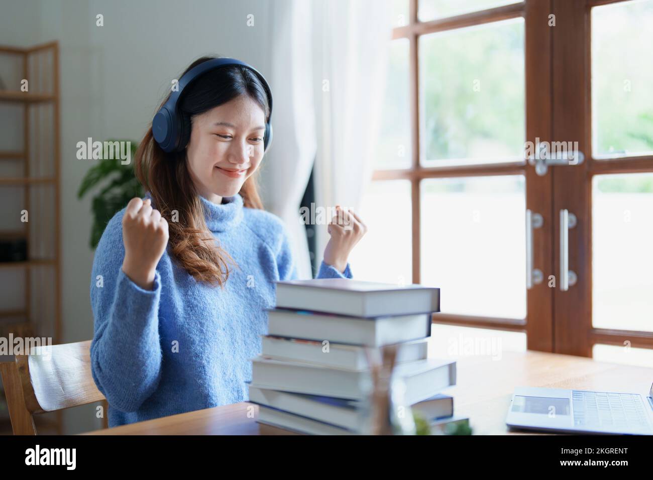 Portrait of young beautiful Asian woman showing smiling face during ...