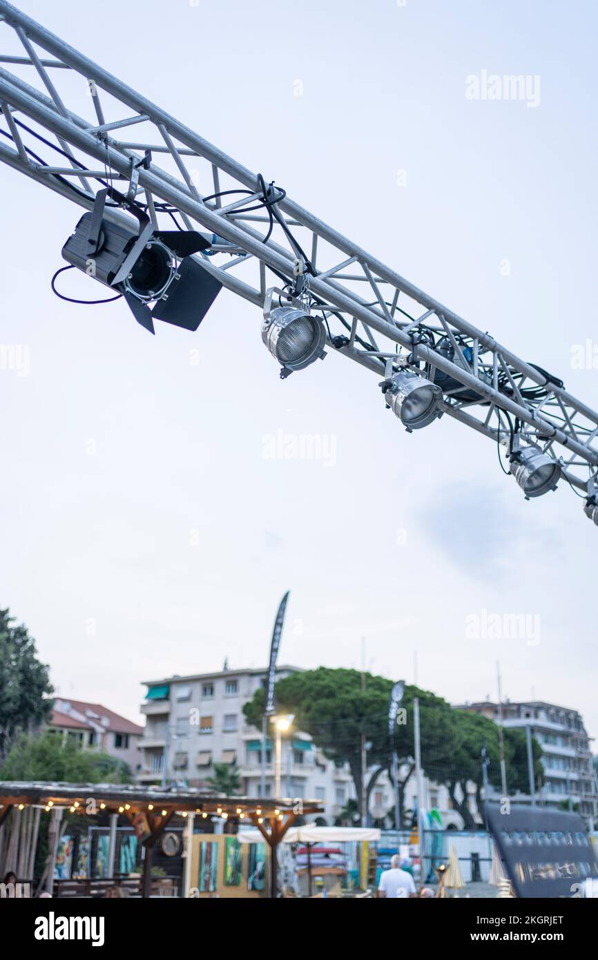 A selective focus of a metal frame with attached spotlights on an ...