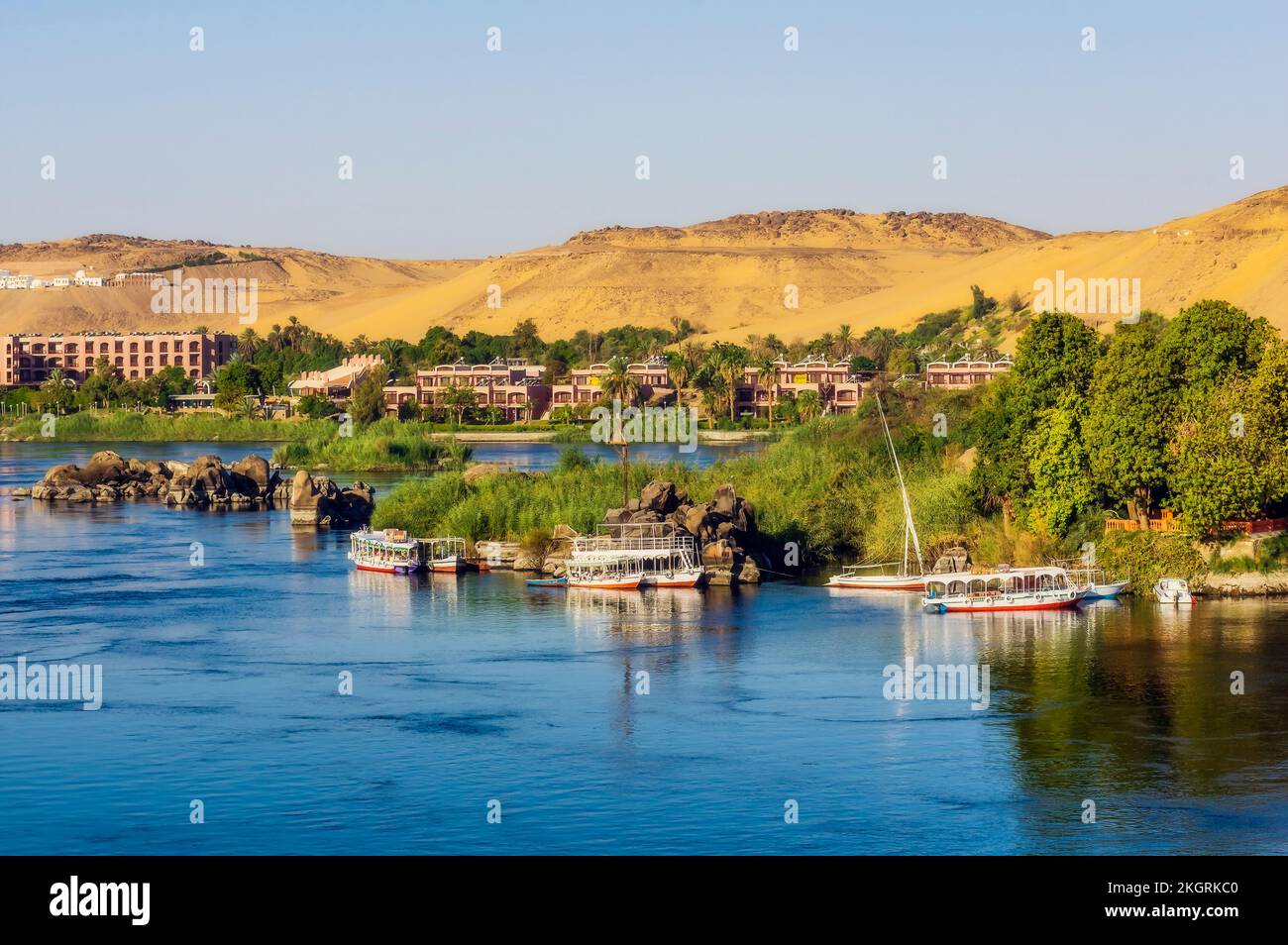 Egypt, Aswan Governorate, Aswan, Tourboats moored on bank of Nile river ...