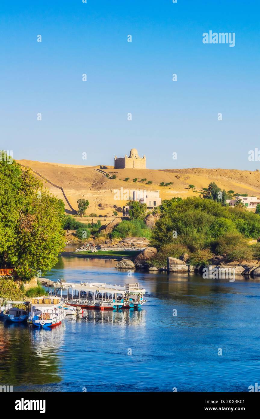 Egypt, Aswan Governorate, Aswan, Tourboats moored on bank of Nile river ...