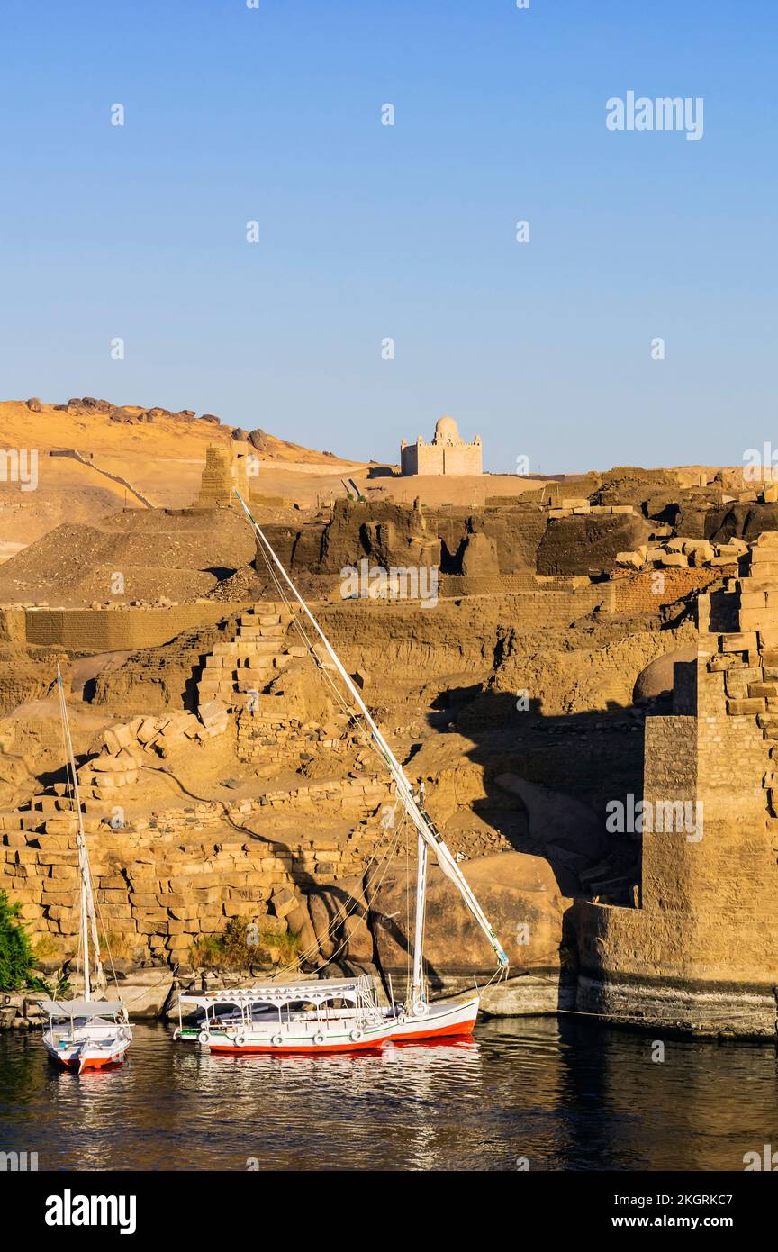 Egypt, Aswan Governorate, Aswan, Sailboats floating on bank of Nile ...