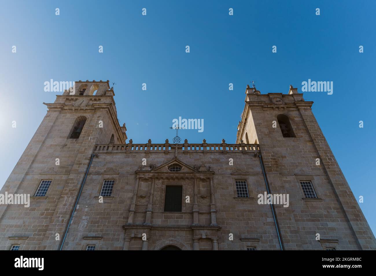 A low-angle of Co-cathedral of Miranda do Douroagainst clear, sunlit ...