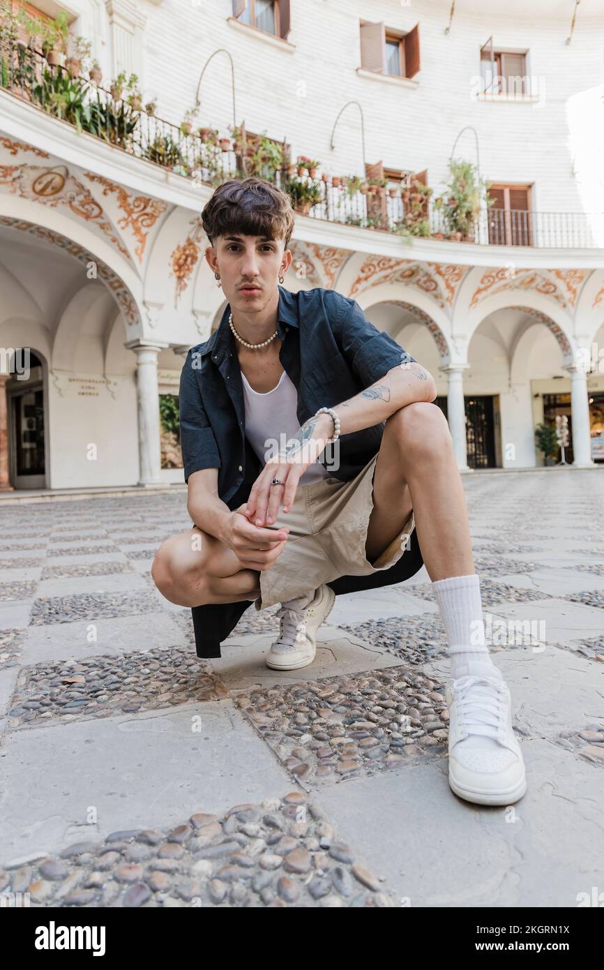 Crouching exterior hi-res stock photography and images - Alamy