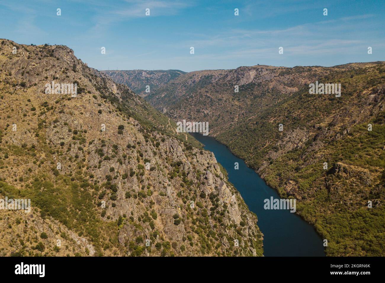 An aerial of Douro international riverside view covered with yellow ...
