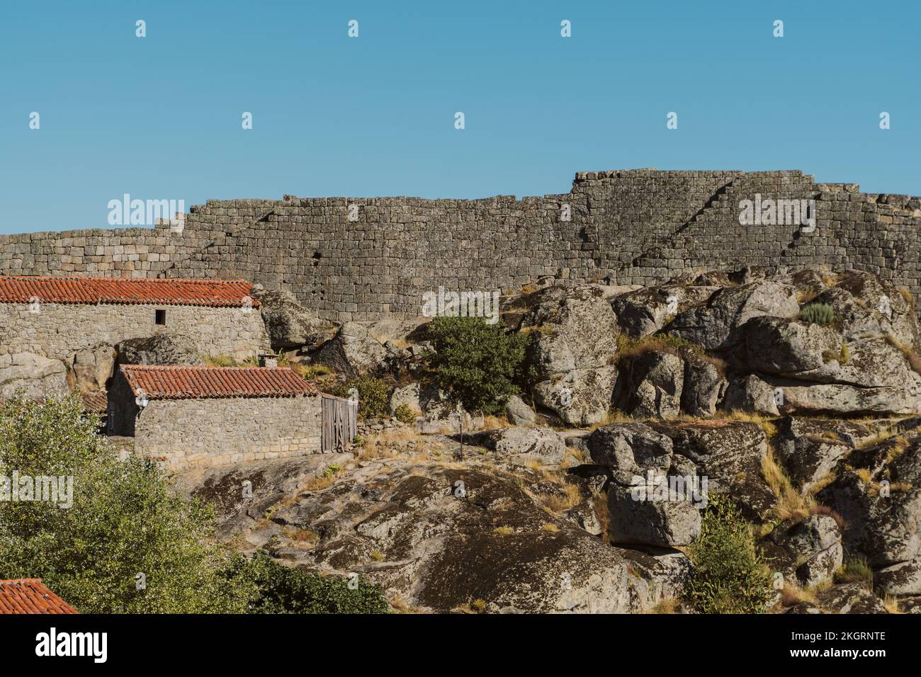 A low-angle of Castle of Monsanto clear sunlit sky background Stock ...